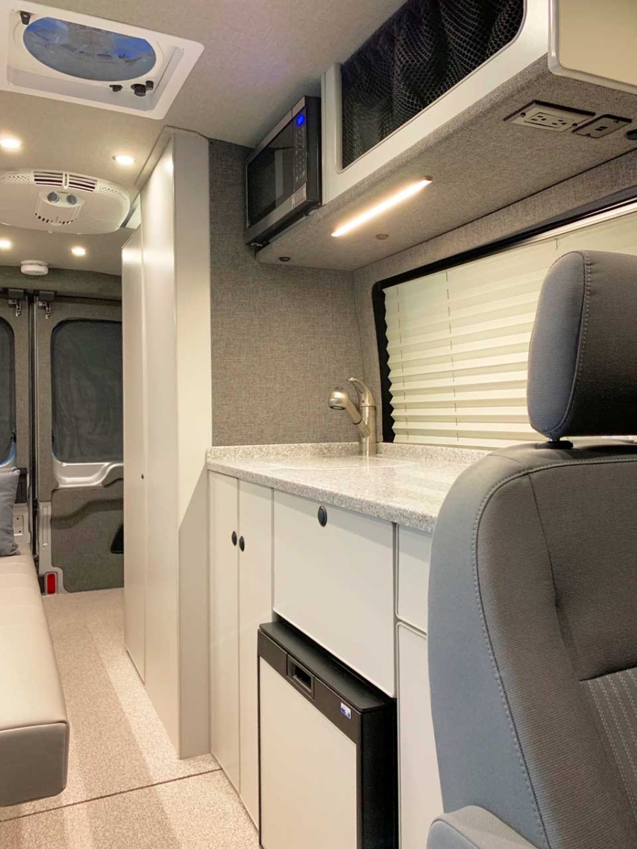 Modern Ford Transit Van Conversion + Leather Lounge + Bath + Storage