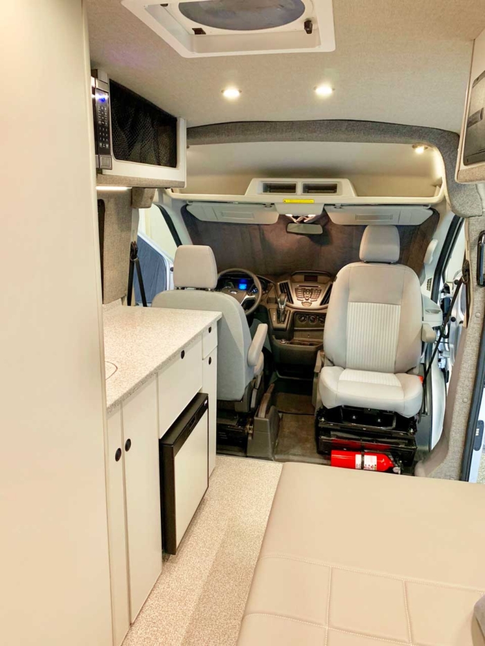 Modern Ford Transit Van Conversion + Leather Lounge + Bath + Storage